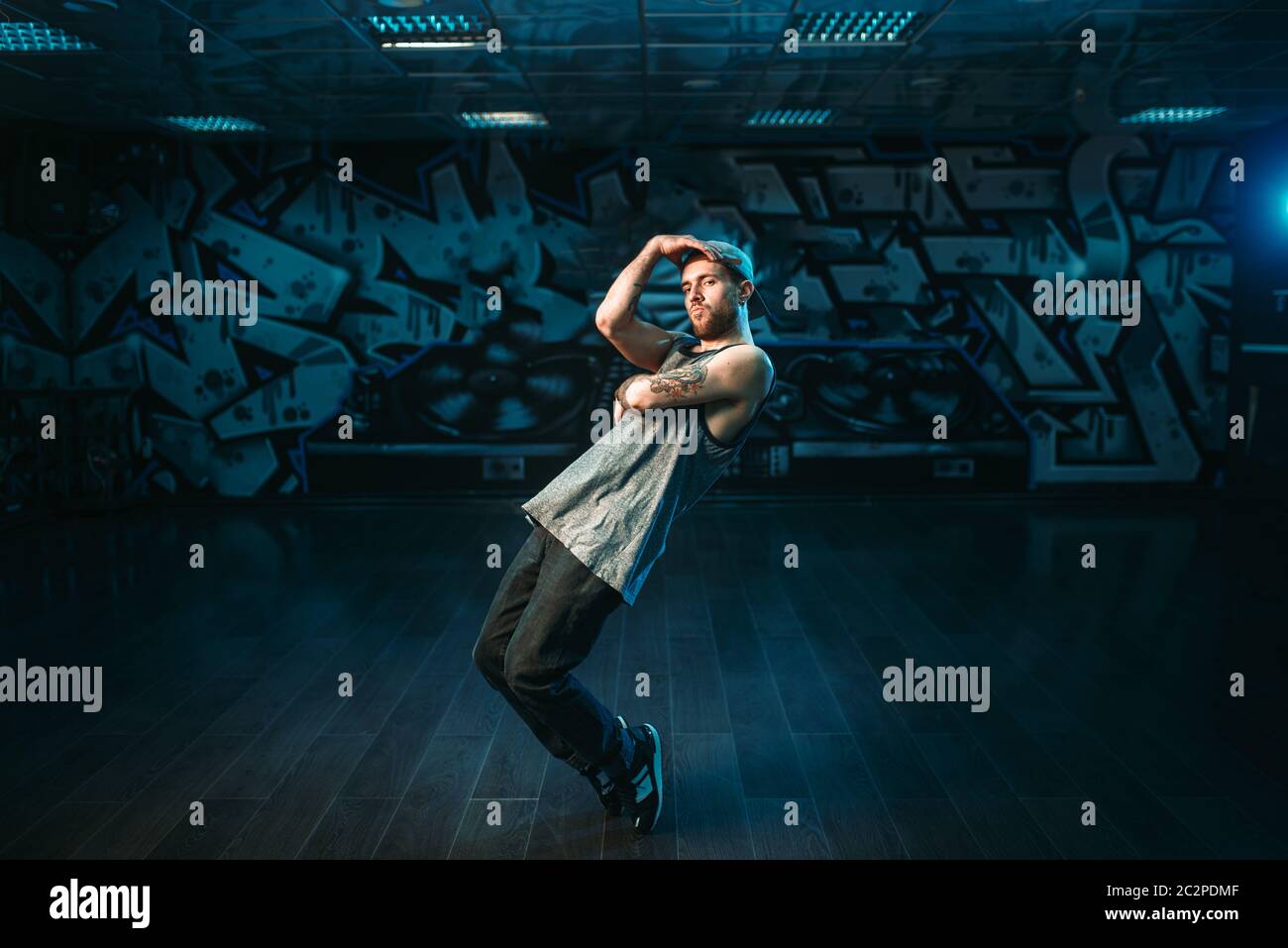 Male rapper in dance studio, rap performer. Modern urban dancing style Stock Photo - Alamy