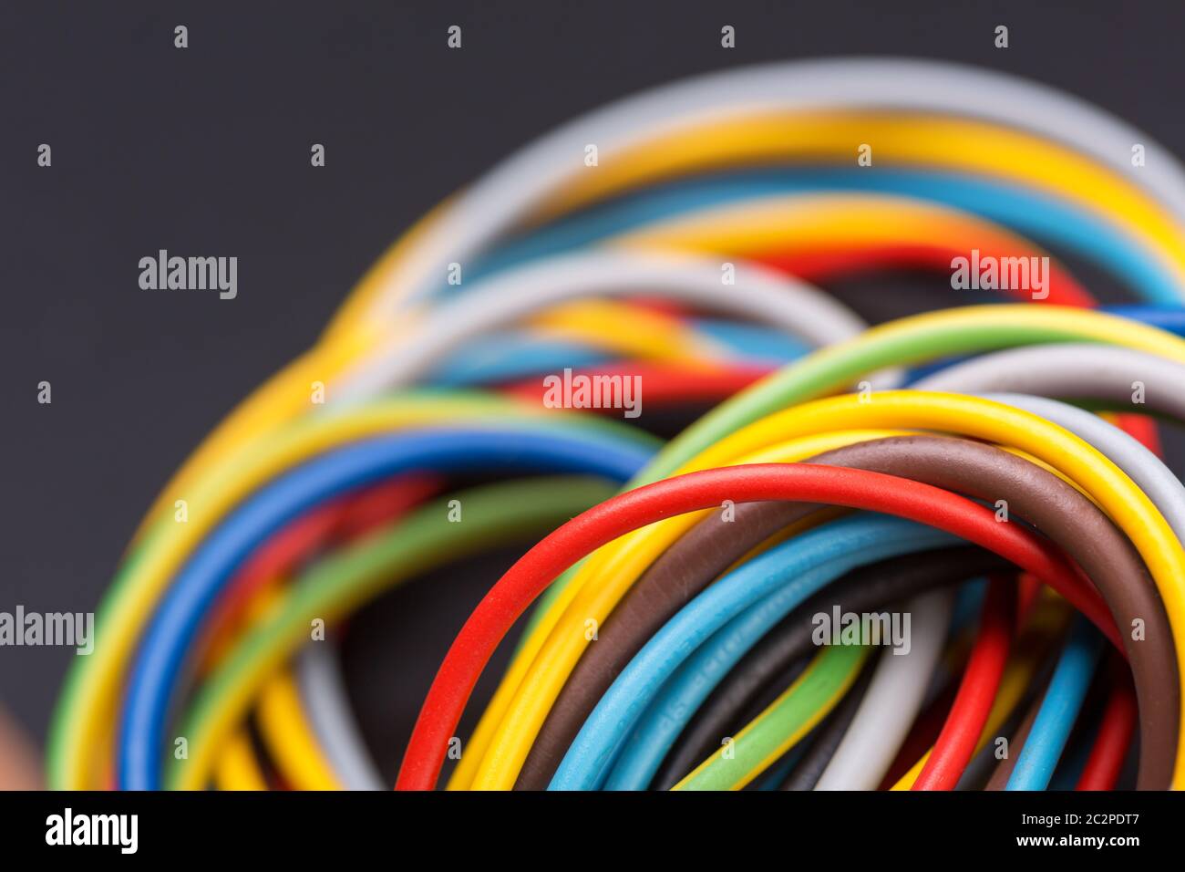 Colorful power cables closeup picture Stock Photo - Alamy