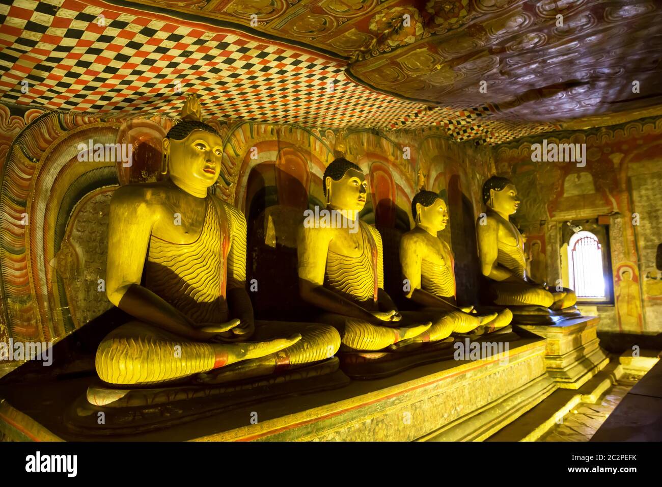 Ancient golden statues in buddha temple on Ceylon. Sri Lanka, Unesco ...