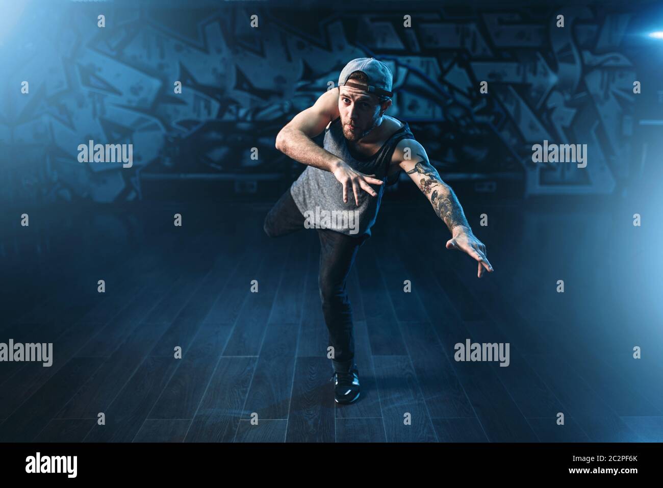 Breakdance motions, performer in dance studio. Modern urban dancing style Stock Photo - Alamy
