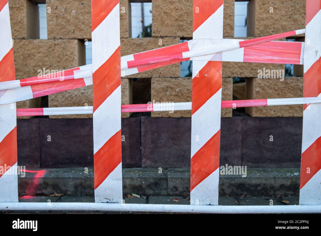 warning strip on the road prohibiting entry Stock Photo - Alamy