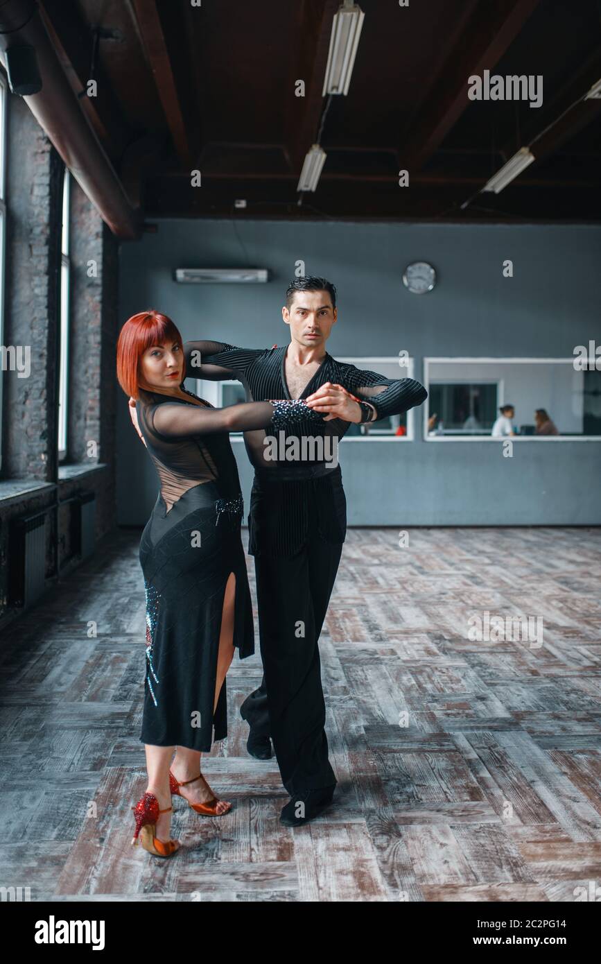 Attractive male and female dancing tango hi-res stock photography and images - Alamy