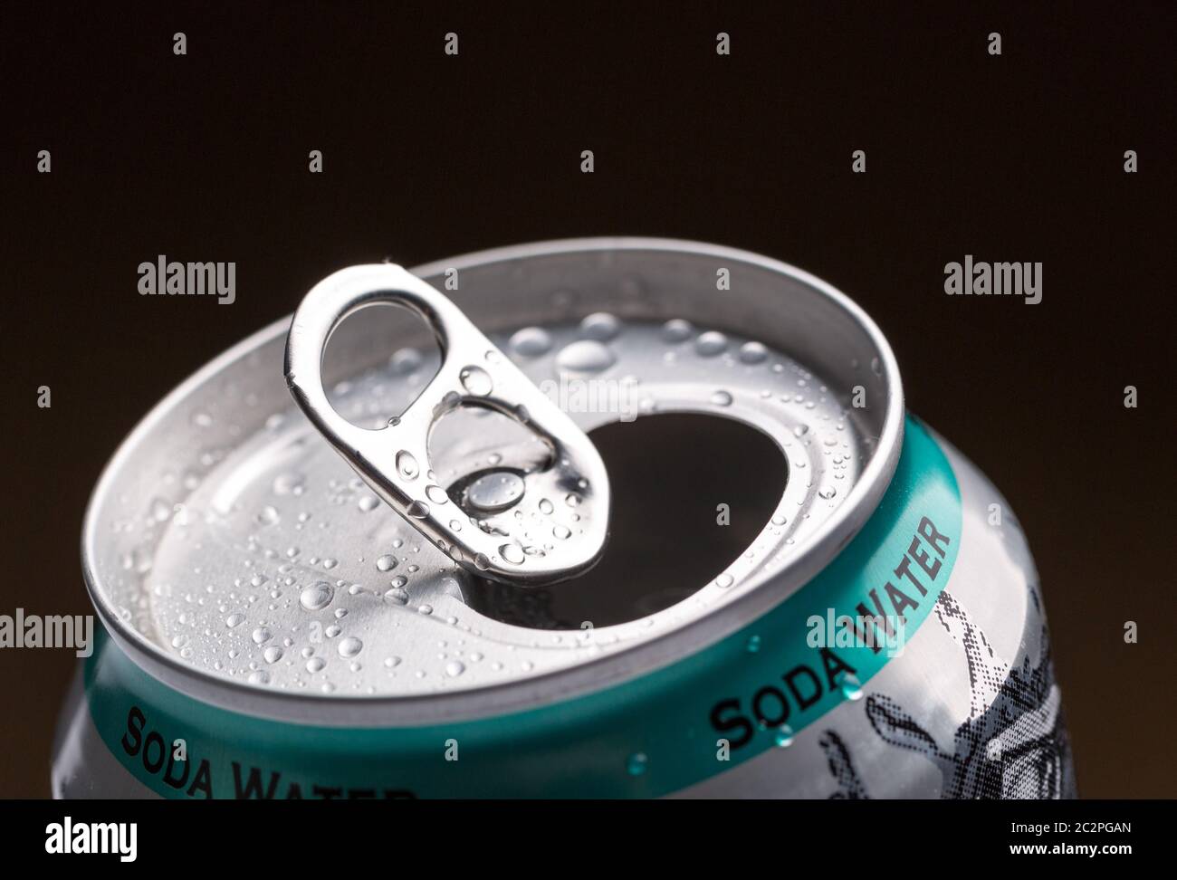 Aluminum can with water drops and soda water inside Stock Photo - Alamy