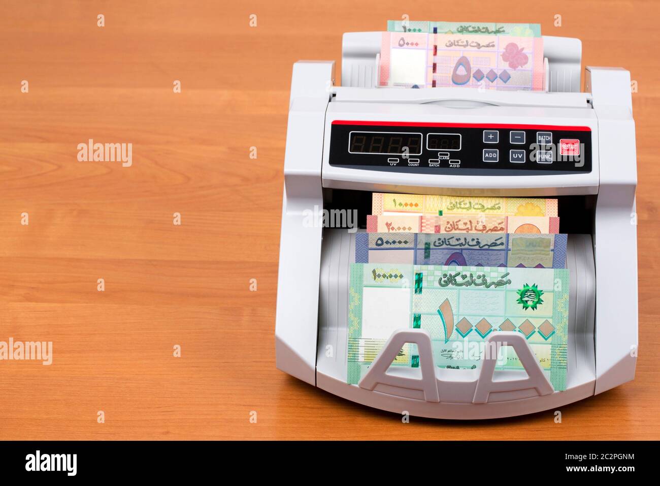 Lebanese money - Pound in the counting machine Stock Photo - Alamy