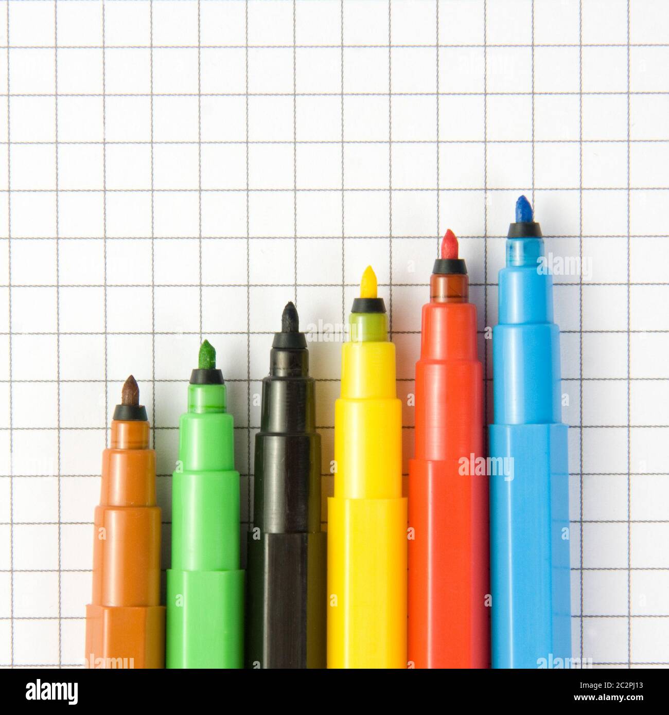 Open color markers on notepad Stock Photo - Alamy