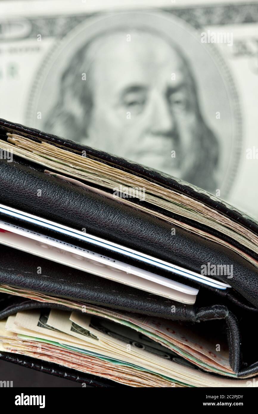 Wallet full of money hi-res stock photography and images - Alamy