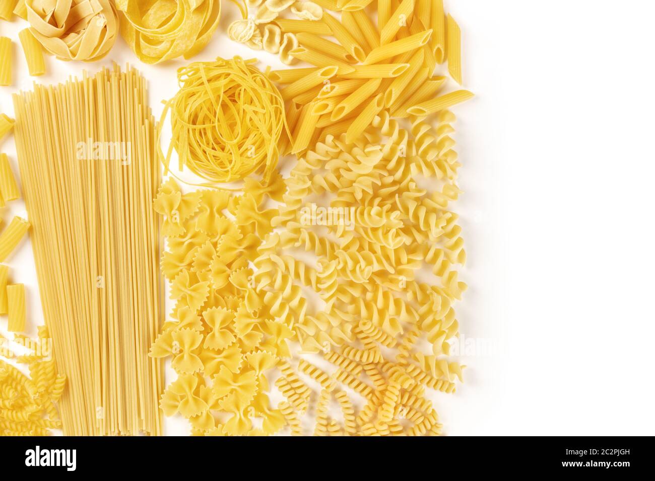 Italian pasta texture on a white background with a place for text, a ...