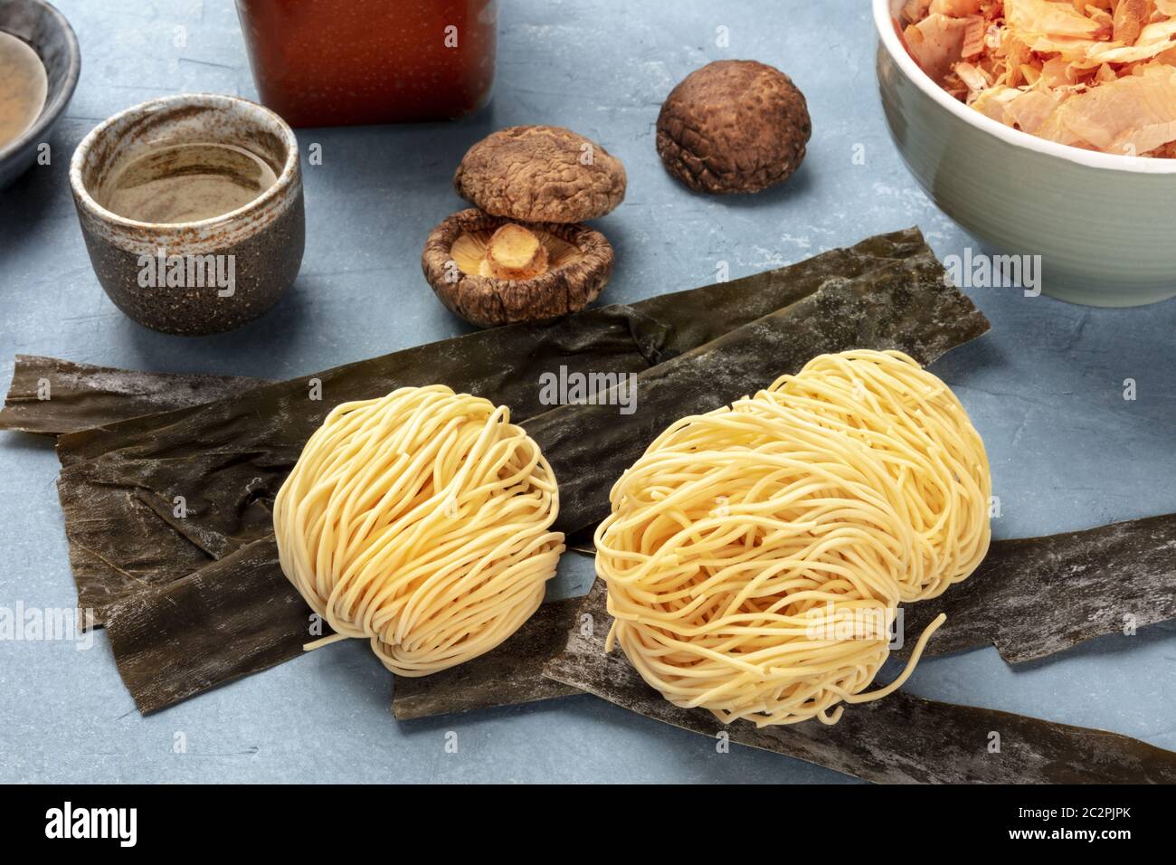Ramen ingredients. Dried sea vegetable kelp, soba noodles, dashi, tuna ...