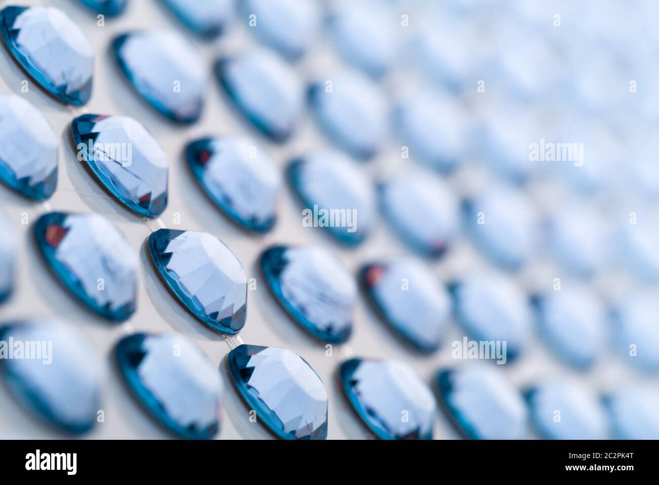 Decorative gems in a row Stock Photo - Alamy