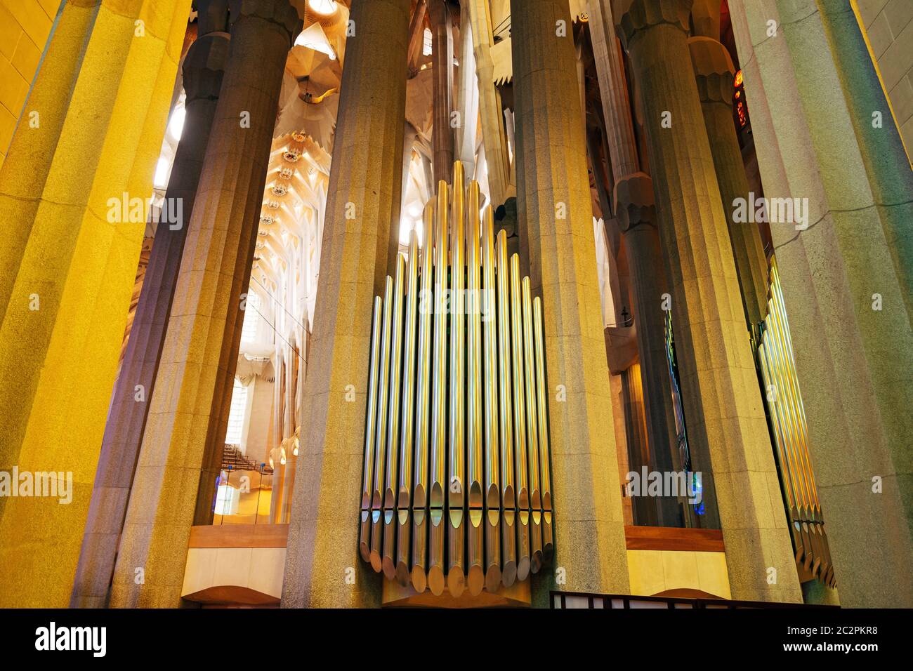 Glossy chrome multicolored organ pipes in Sagrada Familia, Organ ...