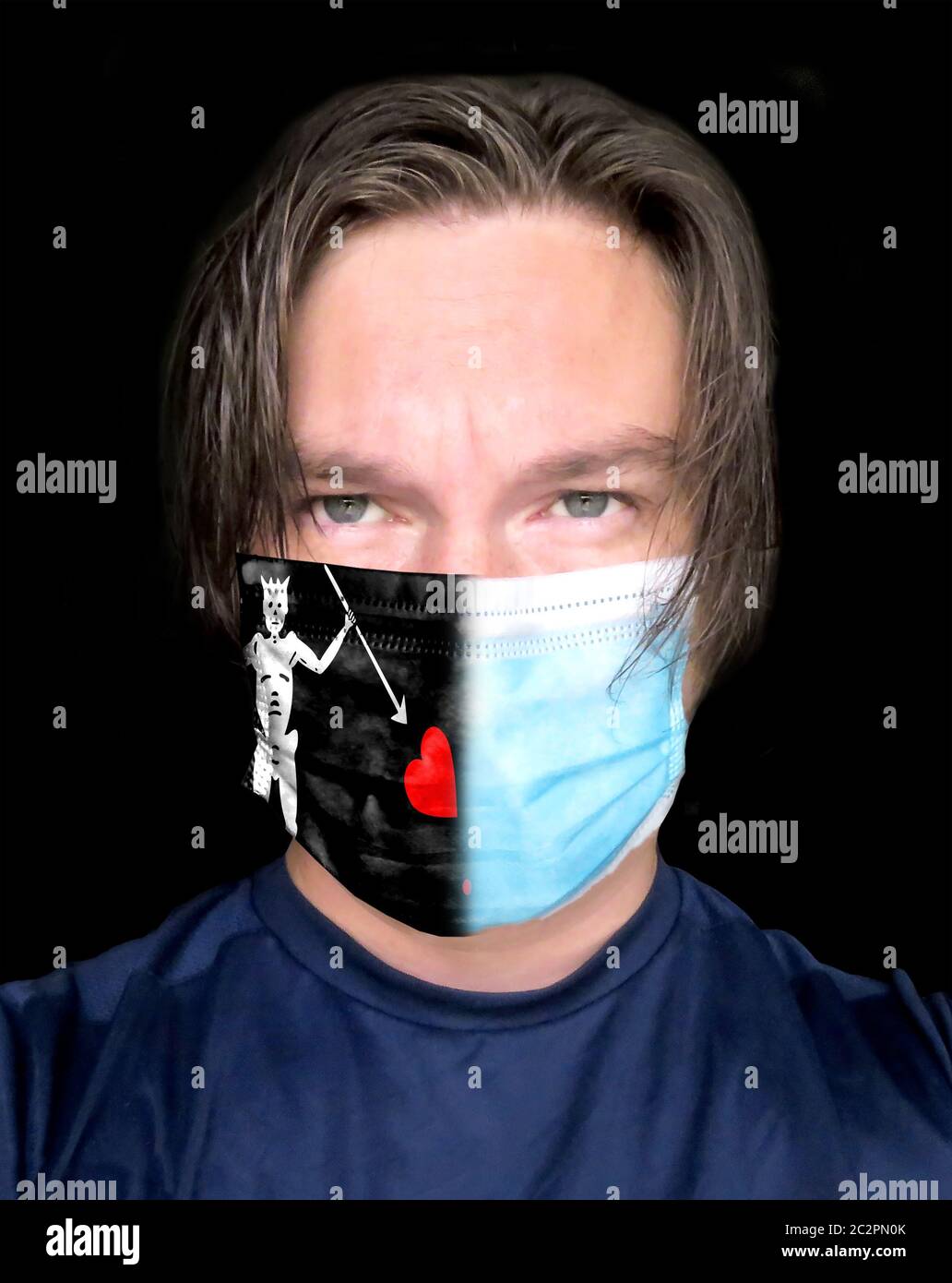 Man in medical mask with Blackbeard Pirate flag on the mask Stock Photo ...