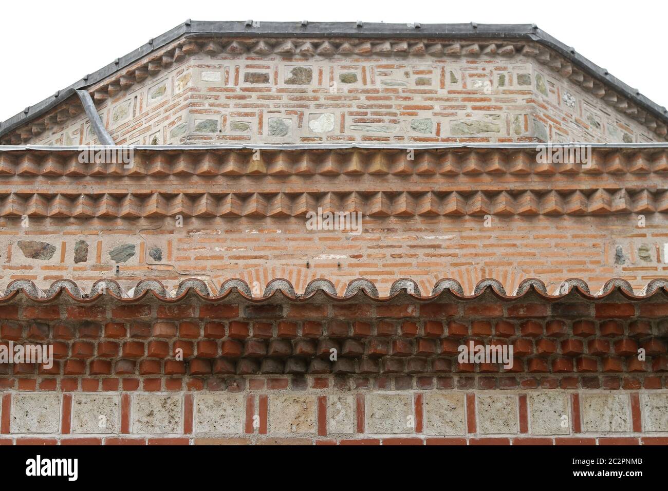 Medieval Style Brick Wall With Decorative Tiles Stock Photo - Alamy