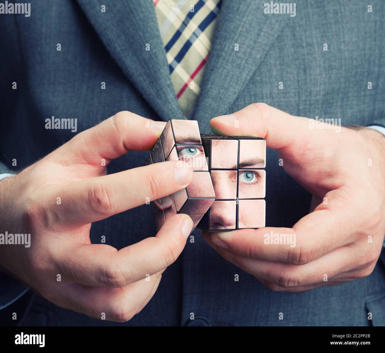 Cube with picture of face Stock Photo - Alamy