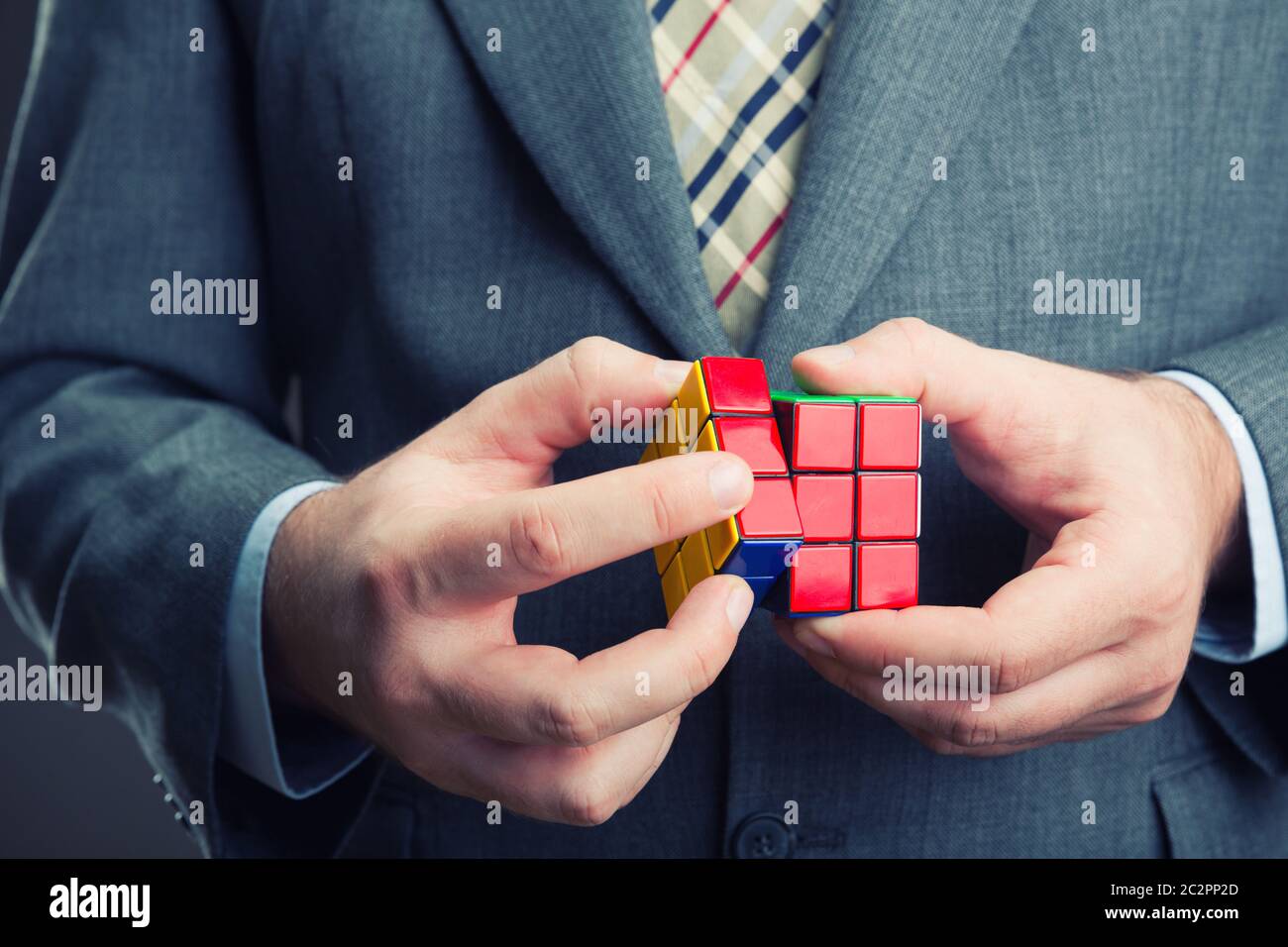 Adult with rubik cube hi-res stock photography and images - Alamy