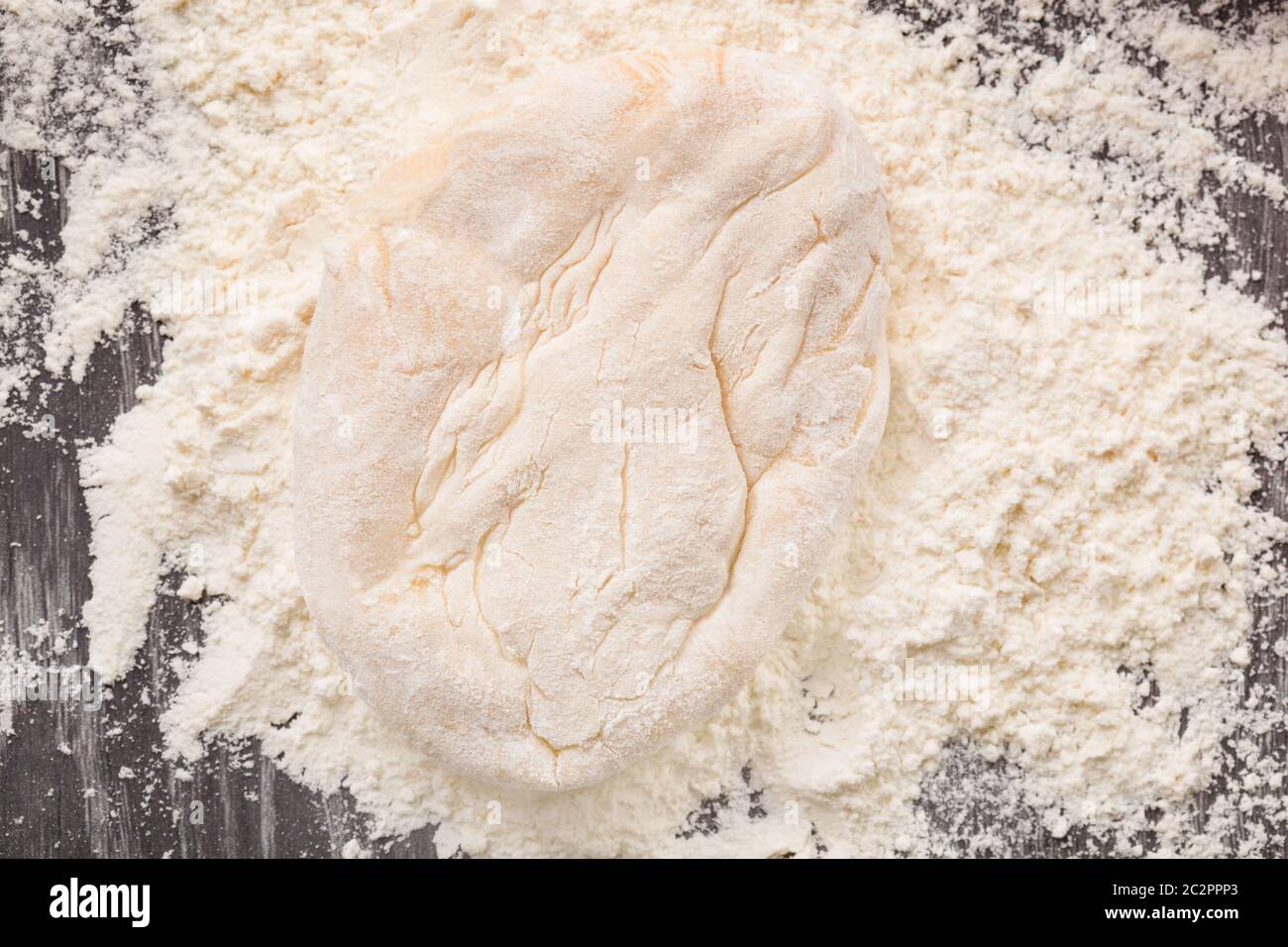 Homemade dough on flour background. Bread and pastry making Stock Photo ...