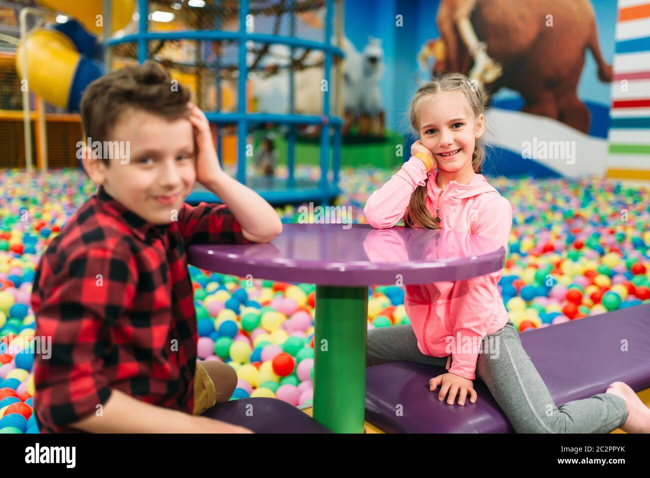Kids leisure, children play in game entertainment center. Happy ...