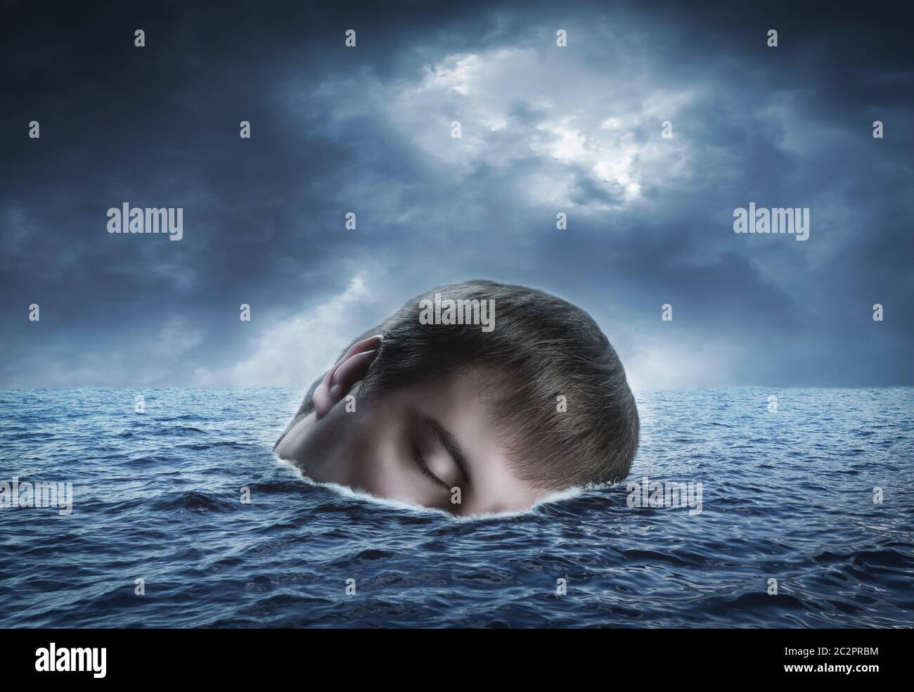 Drifting on the waves in the sea human head Stock Photo - Alamy