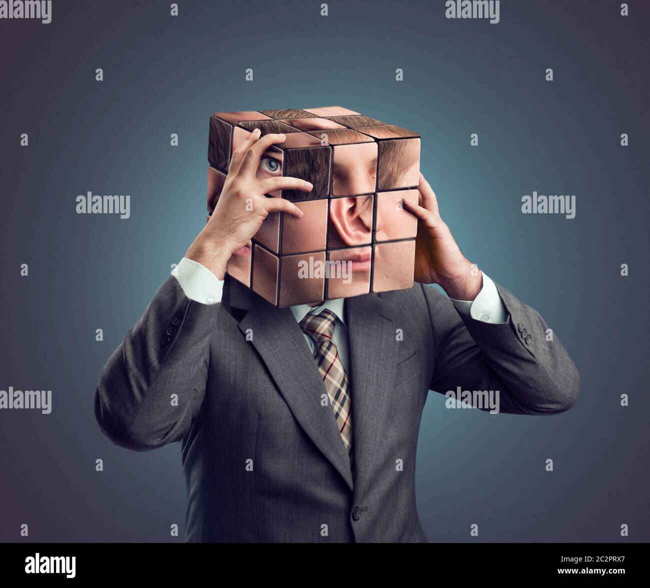 Man with rubik cube hi-res stock photography and images - Alamy