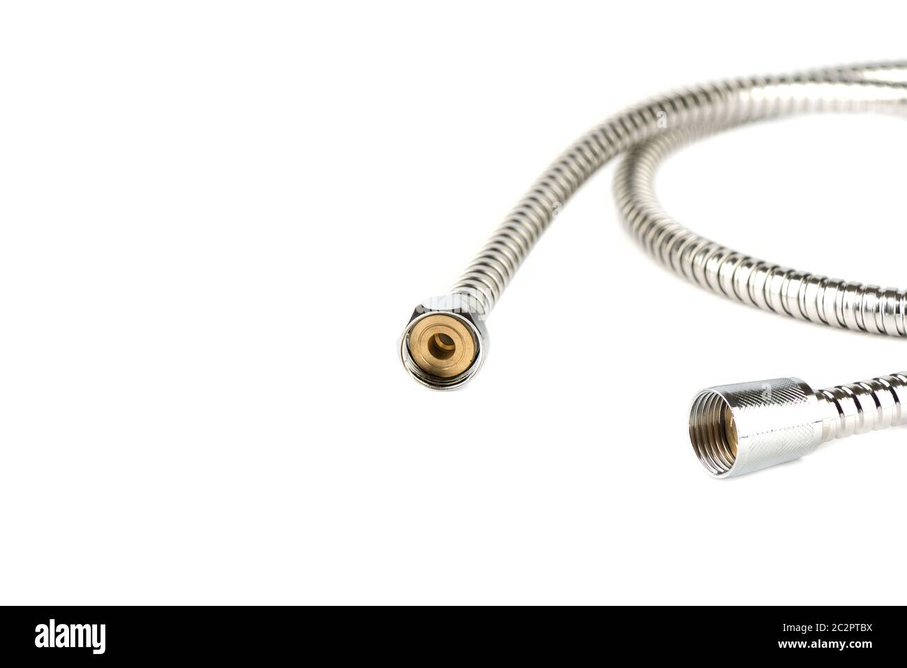 Connectors of a flexible hose for a shower in a bathroom on a white ...