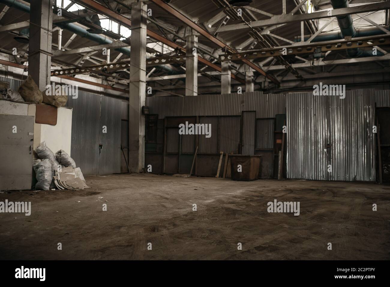Abandoned factory corridor, grunge interior, nobody. Old broken ...