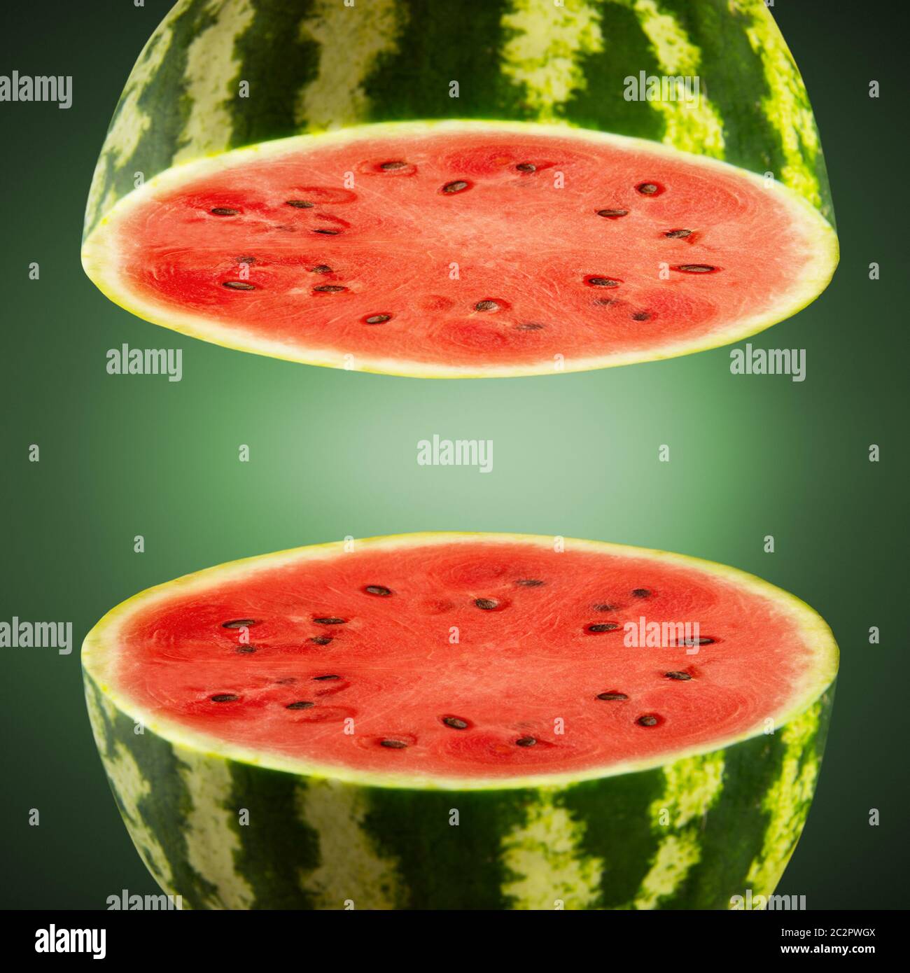 Watermelon cross sections on green gradient background Stock Photo - Alamy