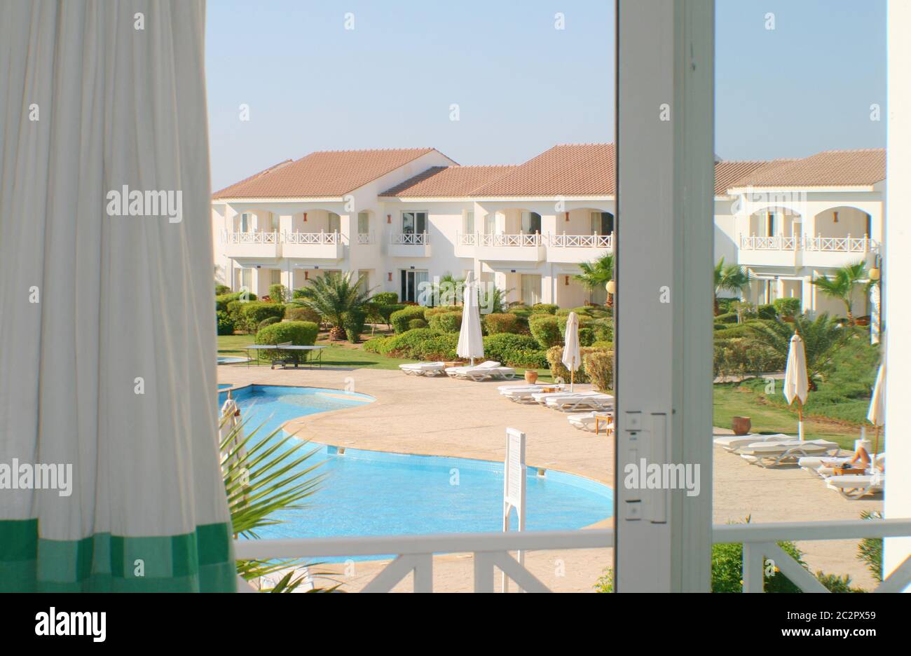 Resort hotel room. Pool view Stock Photo - Alamy