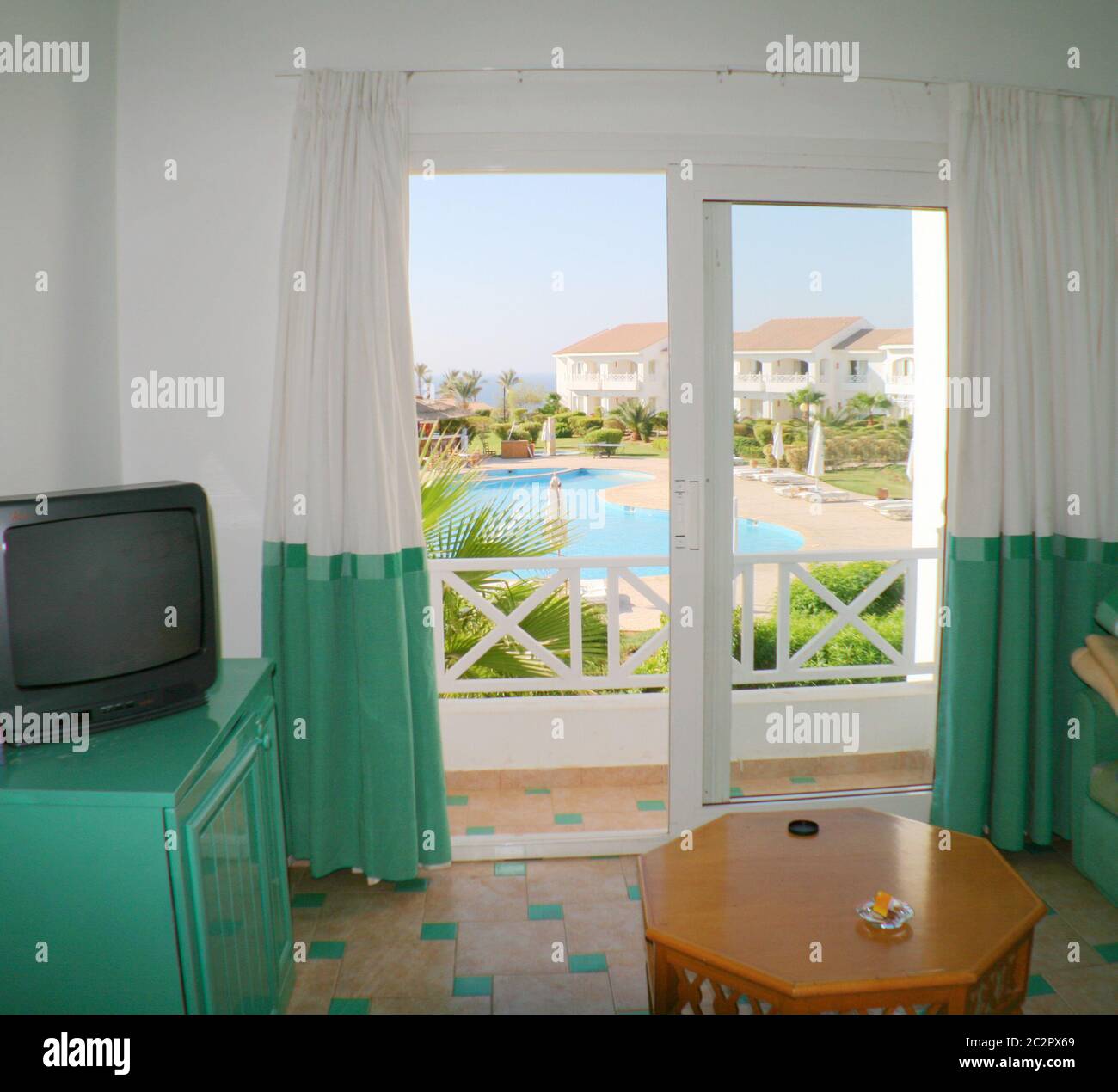 Resort hotel room. Pool view Stock Photo - Alamy