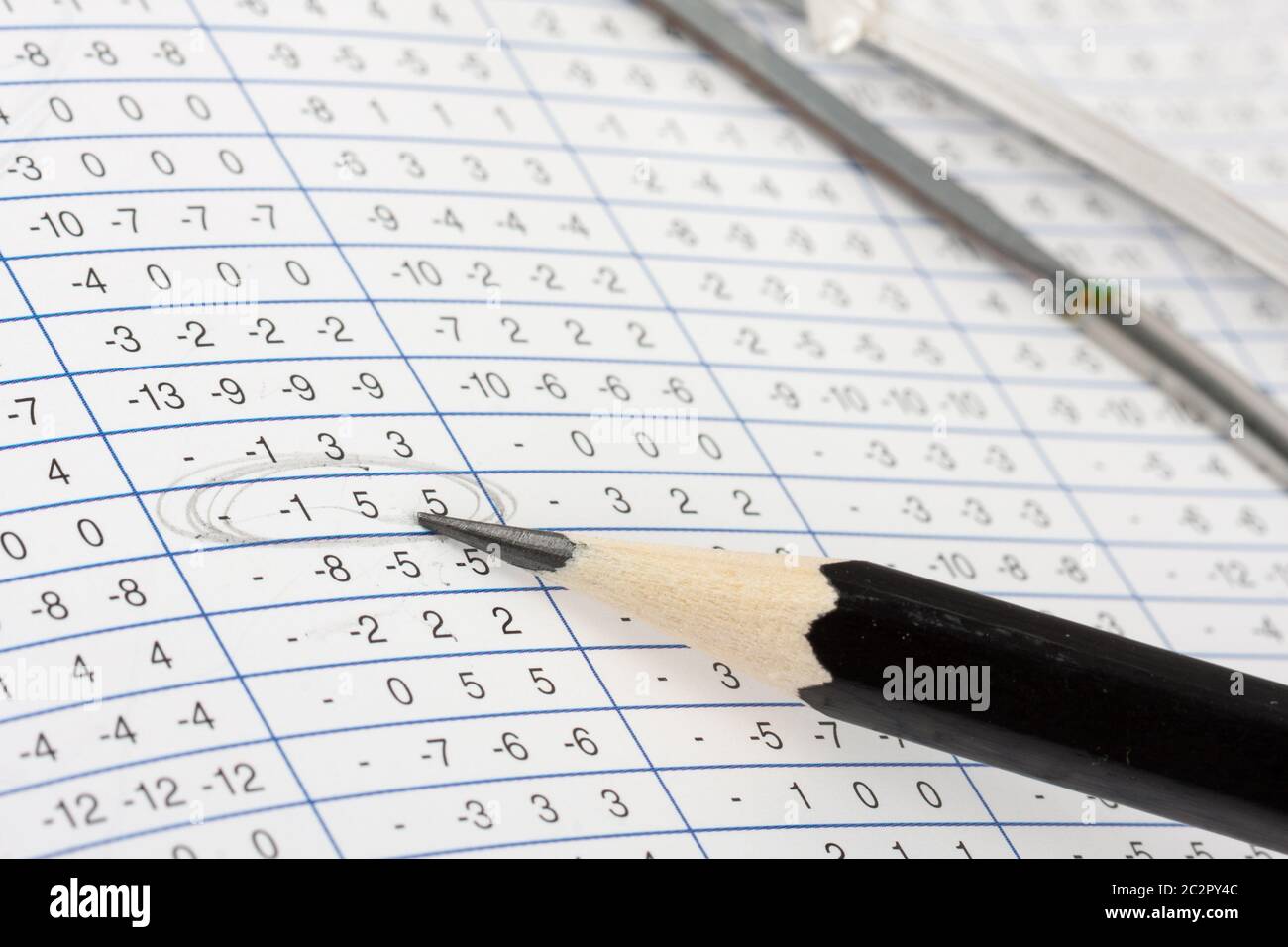Some numbers distinguished on the paper with pencil Stock Photo - Alamy