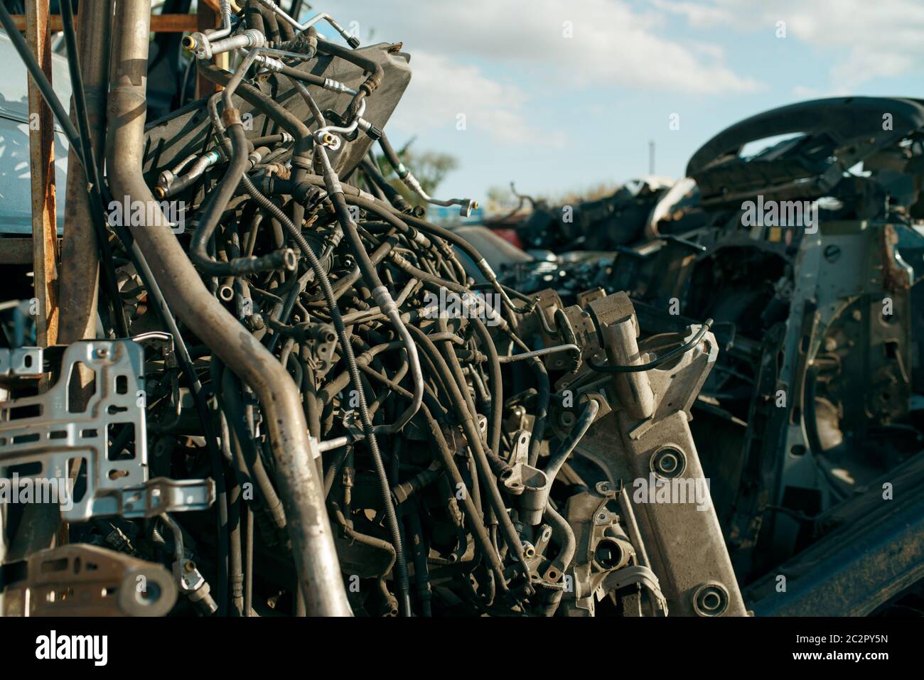 Stacks of car parts on junkyard, nobody. Auto scrap, vehicle junk ...