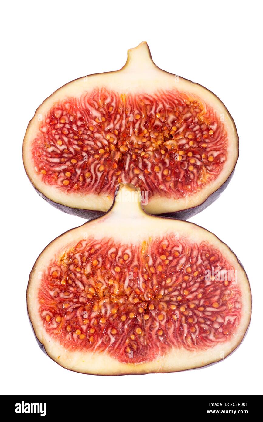 Fresh two halves of figs, isolated on white background, close up. Food ...
