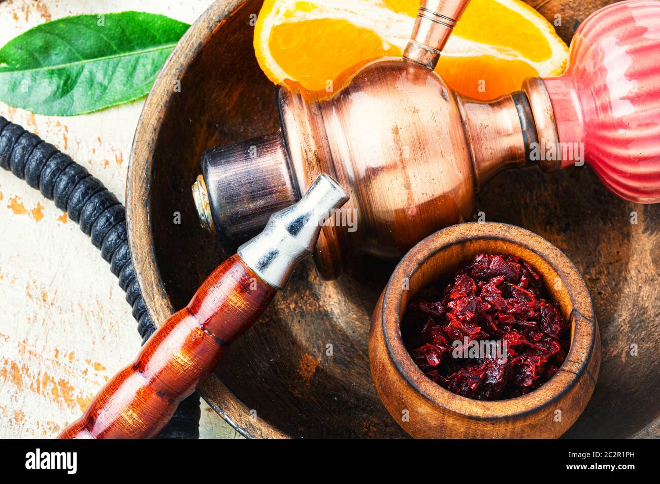 Smoking turkish shisha with orange.Details of Oriental hookah.Egyptian ...