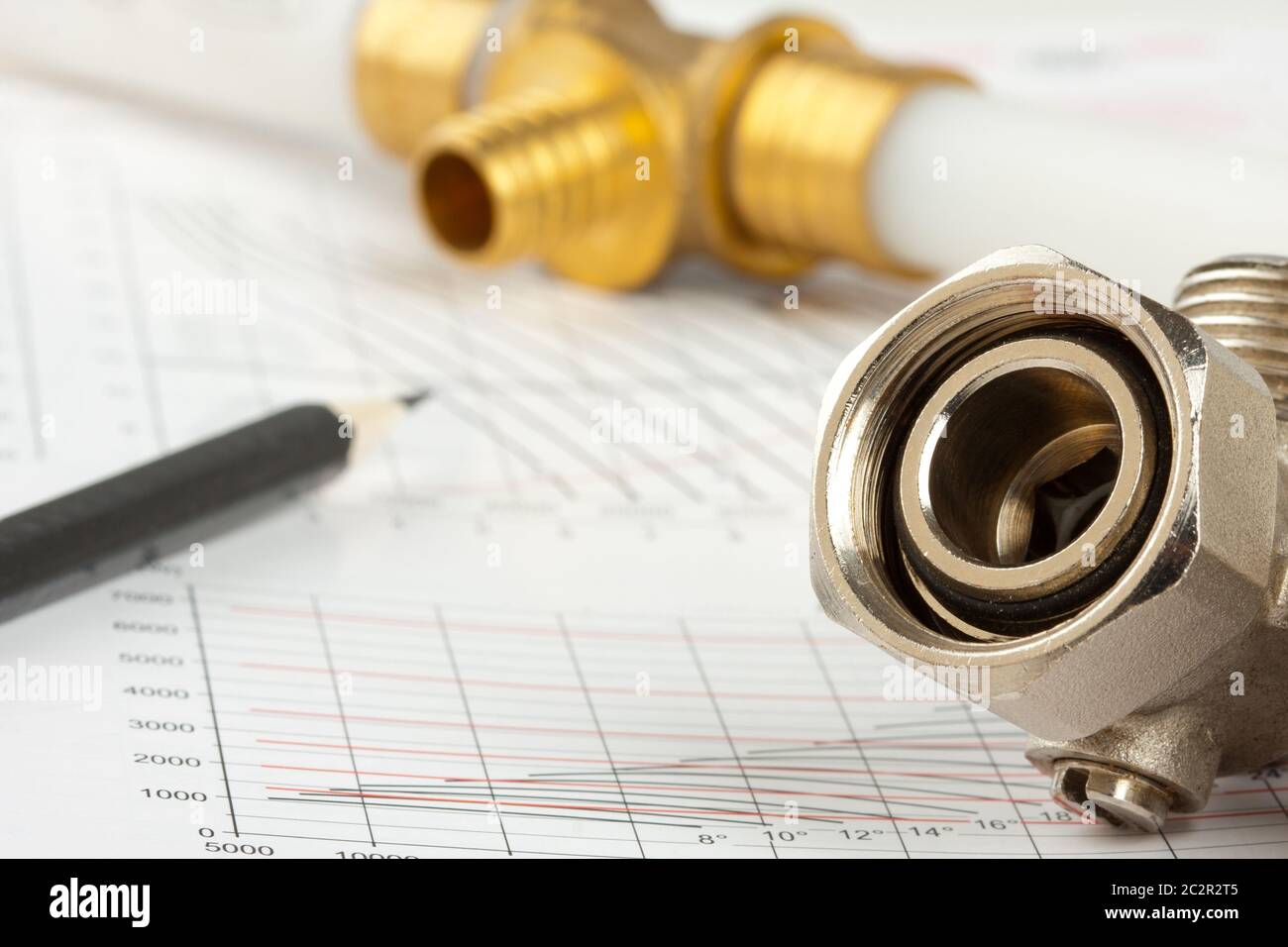 Plumbing supplies - pipes, pencil, documentation and valves Stock Photo ...
