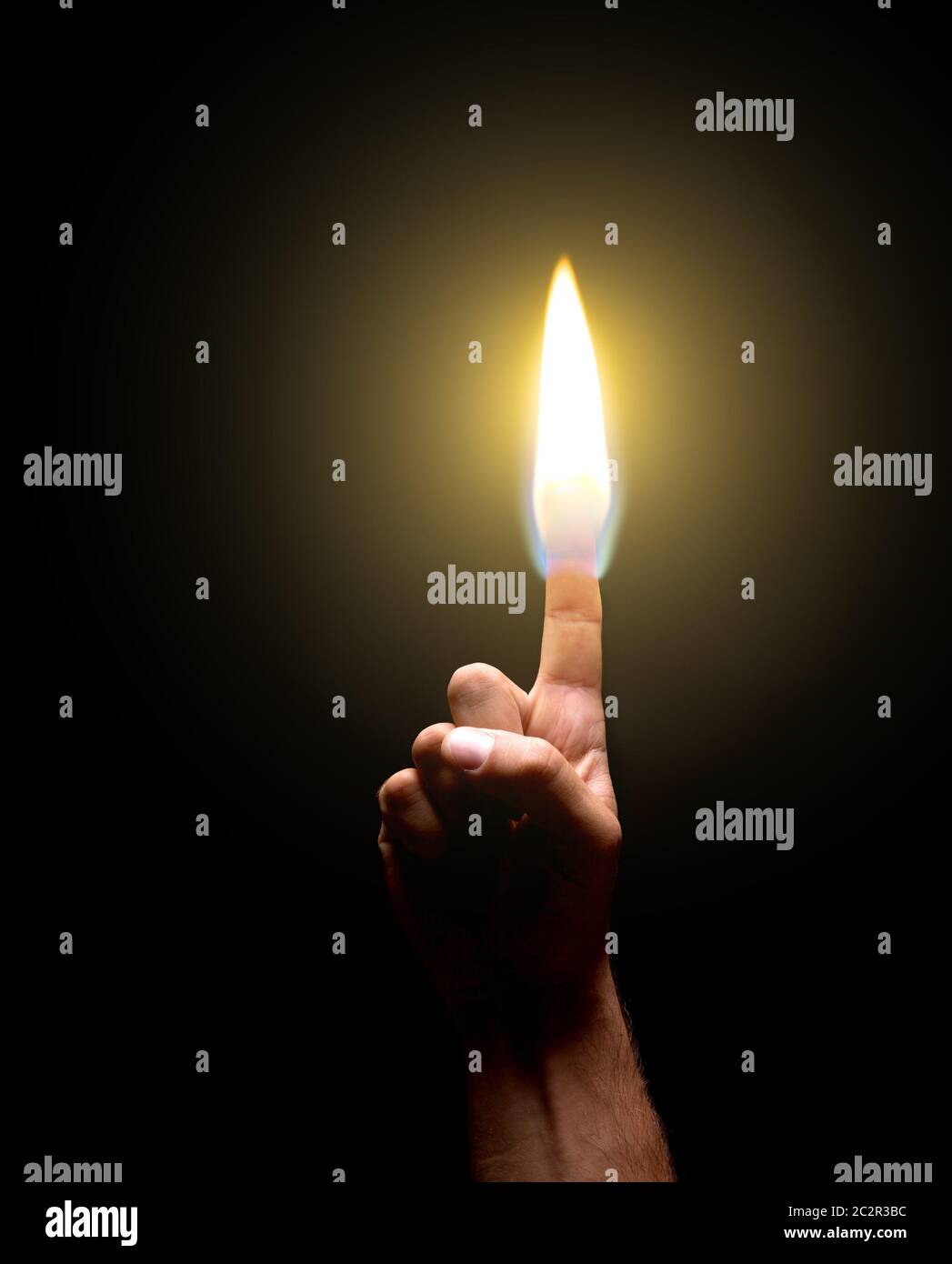 Concept picture with fire from finger Stock Photo - Alamy