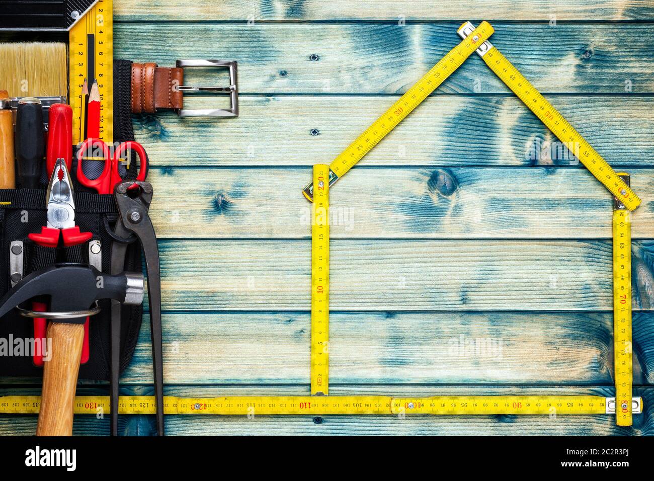 View from above of the bag with carpenter's work tools on an antique ...