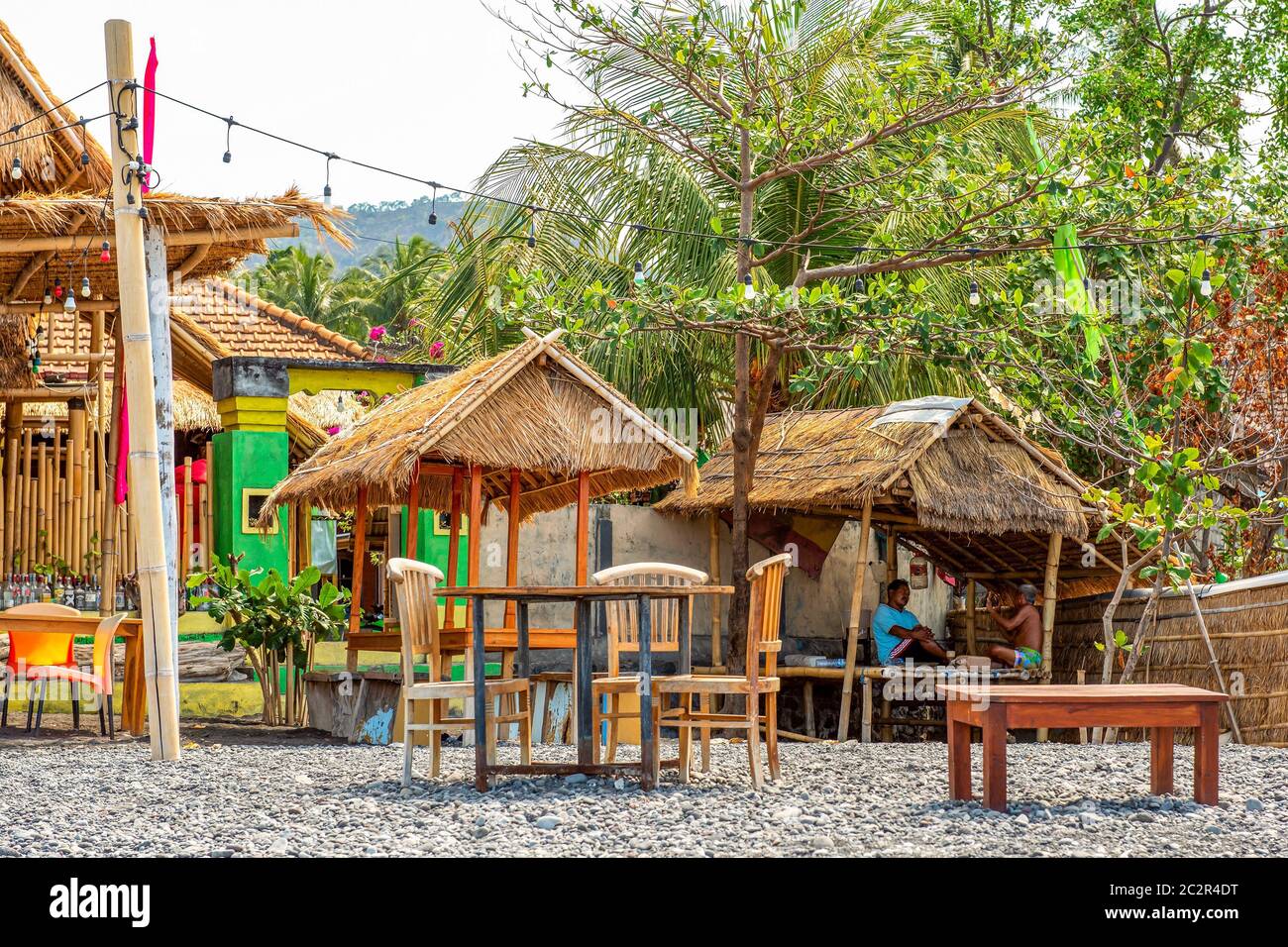 BALI, INDONESIA - December 01, 2019: Typical small cafe on Black Sand ...