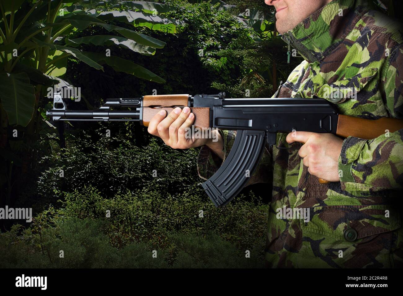 Man holding ak47 gun hi-res stock photography and images - Alamy