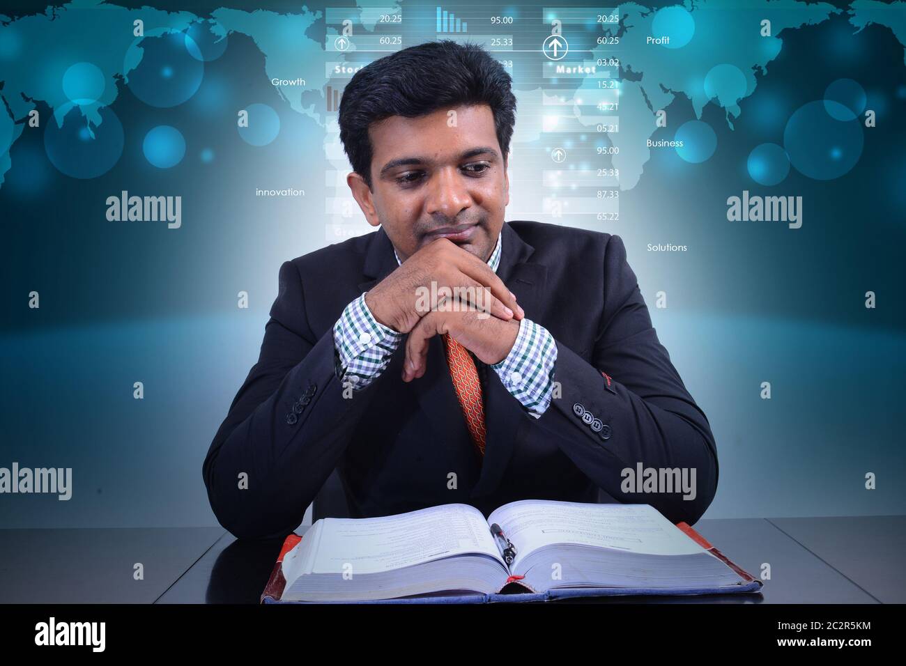 Business man with book Stock Photo - Alamy