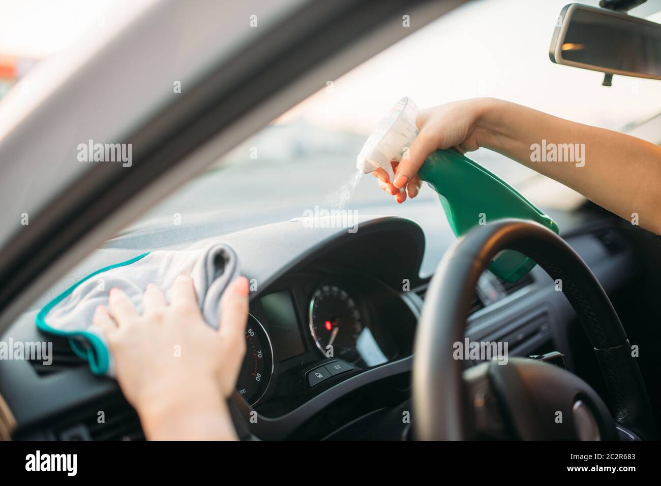 Woman cleaning car dashboard hi-res stock photography and images - Alamy