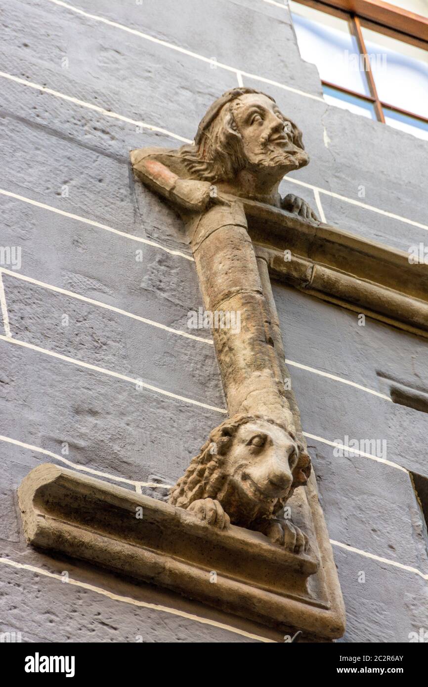 Intricate stone carvings adorning the facade of House Tavel at the ...