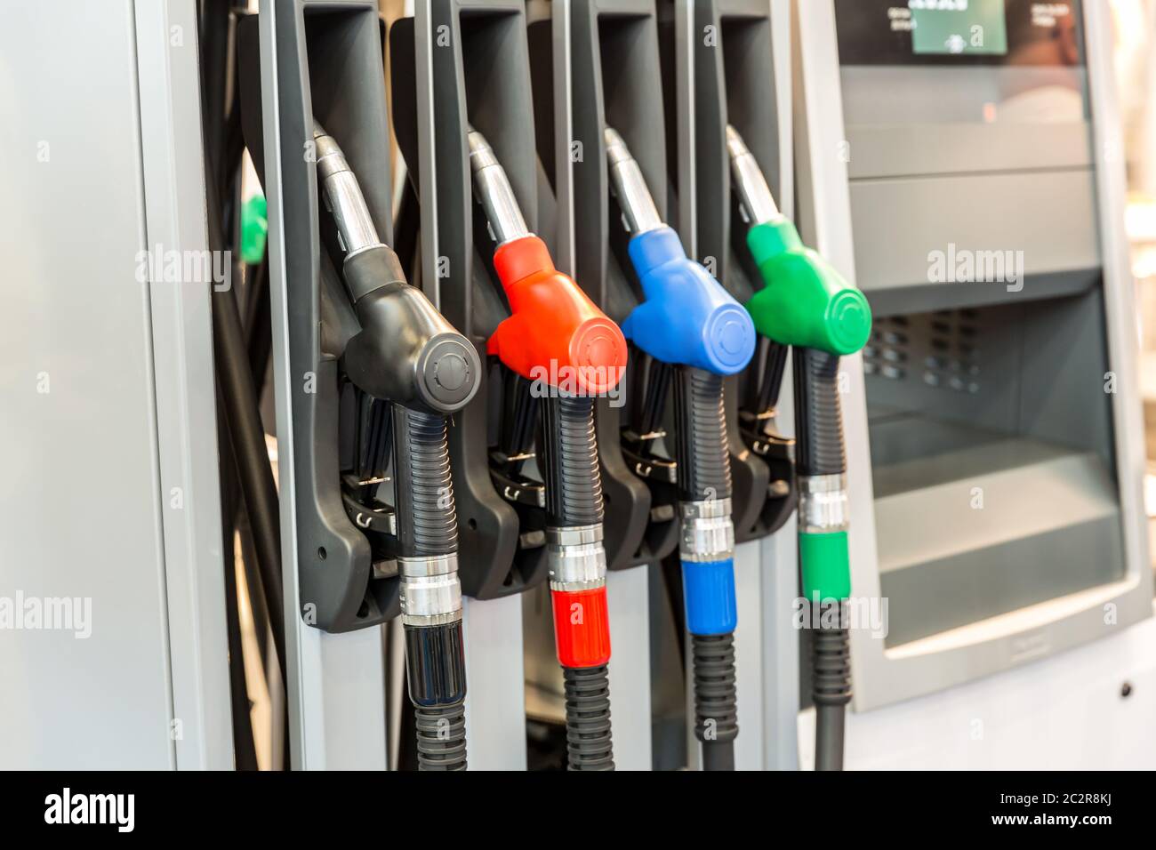 Guns at the gas station closeup, nobody. Car refuel. Unsigned fuel ...