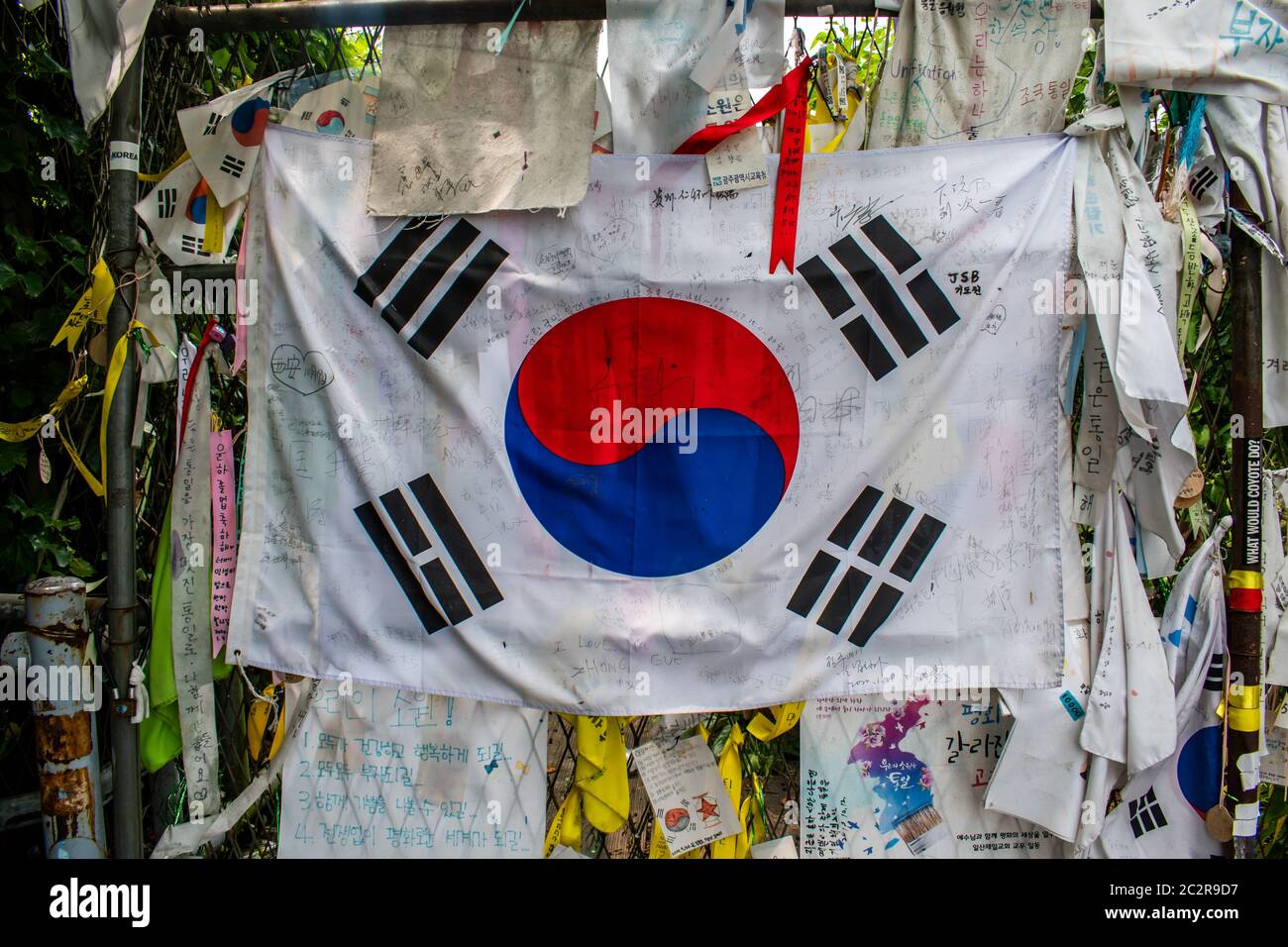 The Korean flag along with other artifacts at the gate of Freedom ...