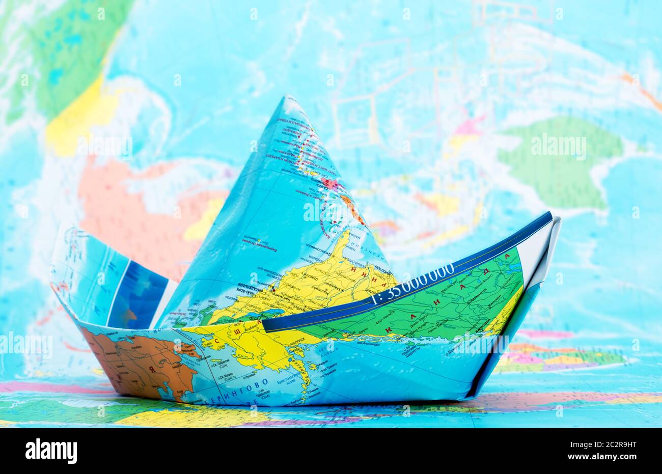 Paper boat made of map Stock Photo - Alamy