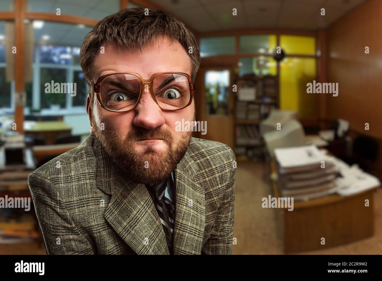 Angry businessman in the office Stock Photo - Alamy