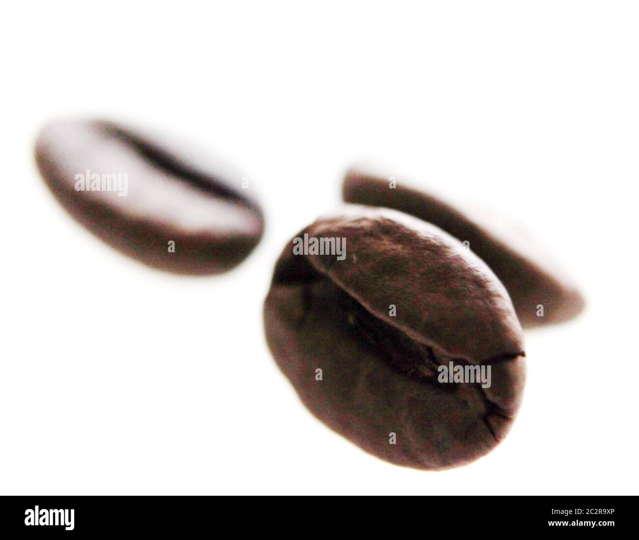 Close-Up Of Coffee Beans Isolated On White Background Stock Photo - Alamy
