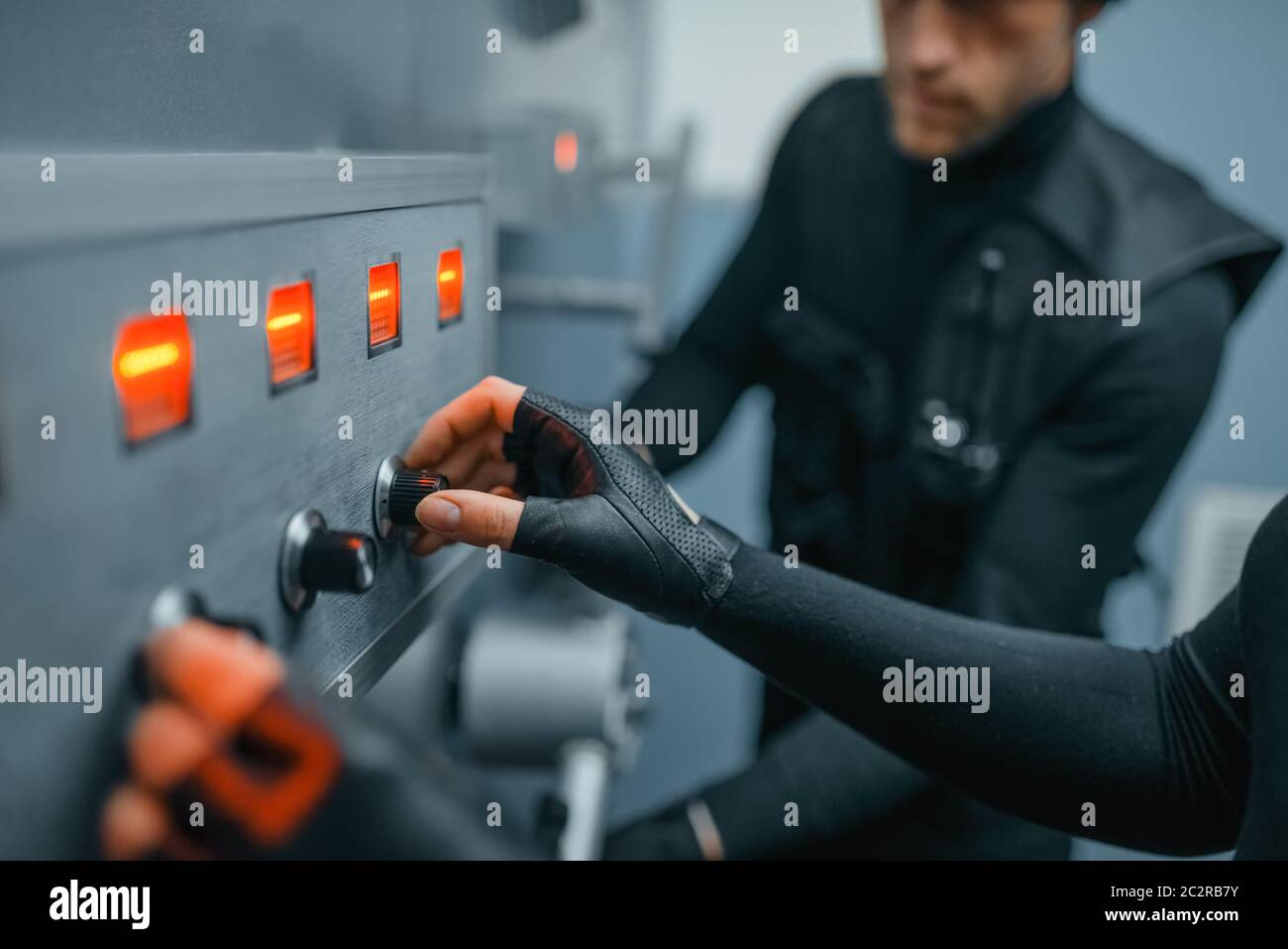 Bank robbery, robbers in black uniform trying to find the code and to ...