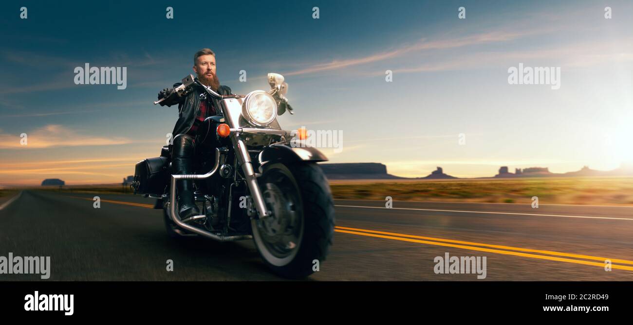 Biker riding on classical chopper, sunset. Vintage bike rider on ...