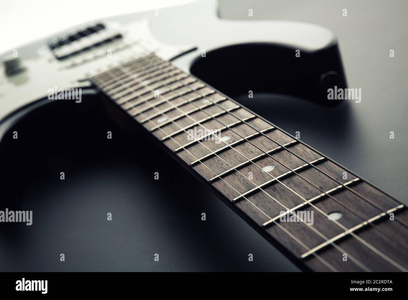 Electric guitar fretboard. Tilt view Stock Photo - Alamy