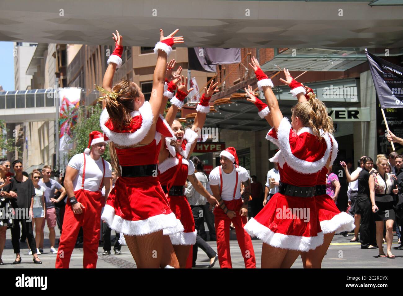 Santa Fest flash mob performs in Pitt Street Mall, Sydney Stock Photo ...