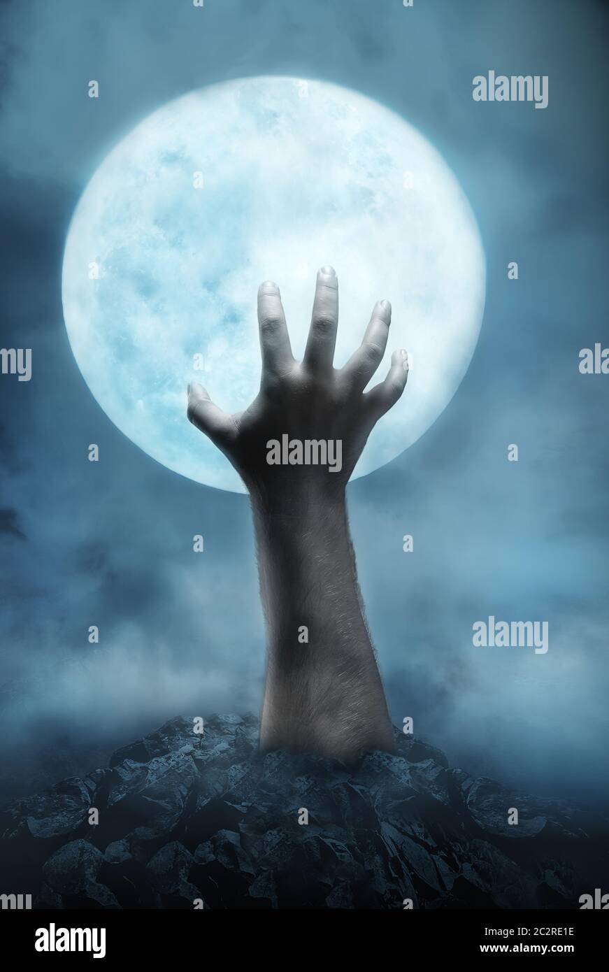 Zombie hand rising from grave hi-res stock photography and images - Alamy