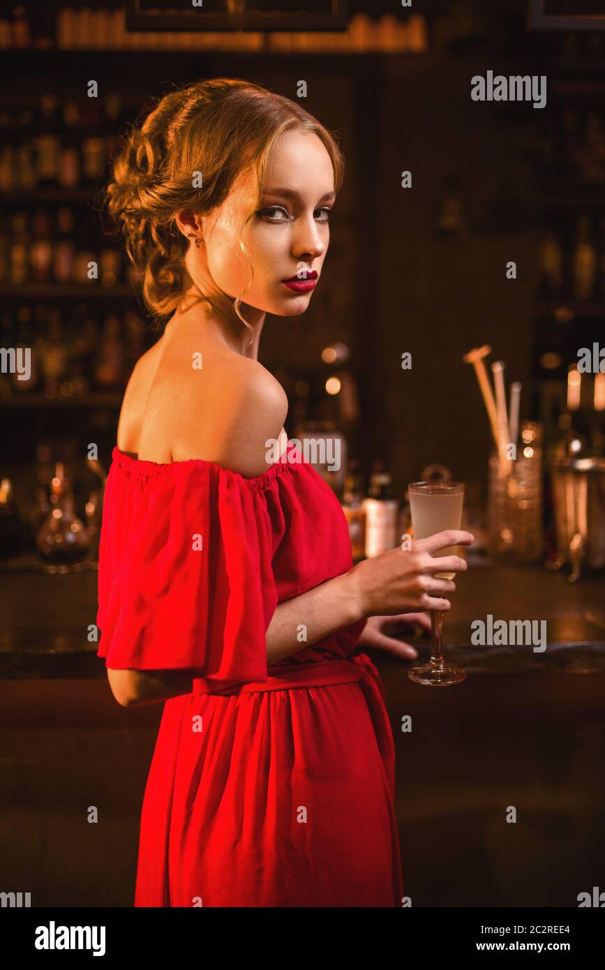 Girl standing bar in nightclub hi-res stock photography and images - Alamy